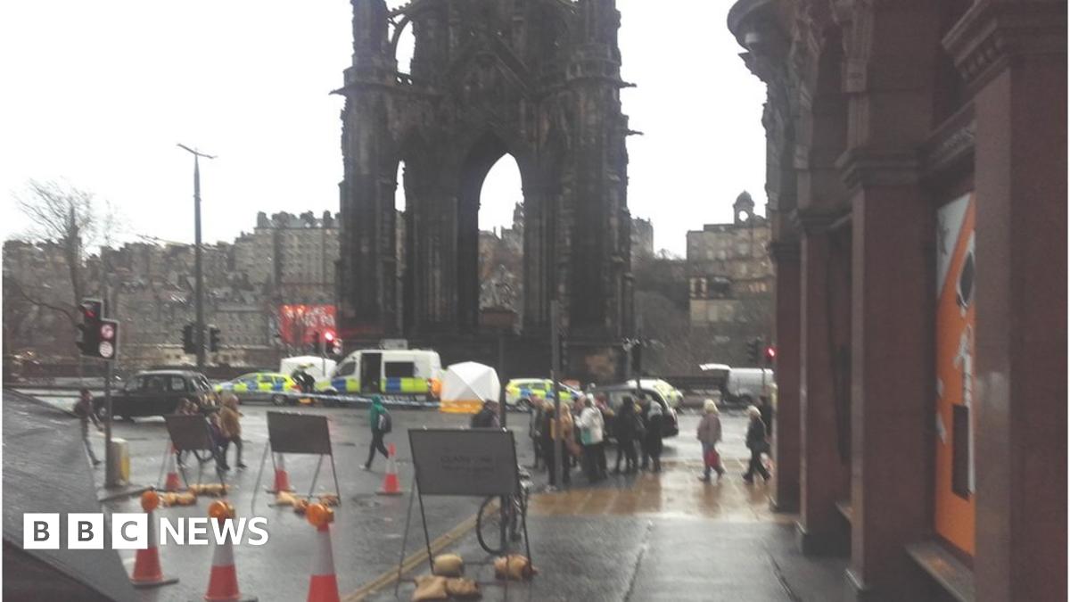 Road closed after man falls from Scott Monument - BBC News