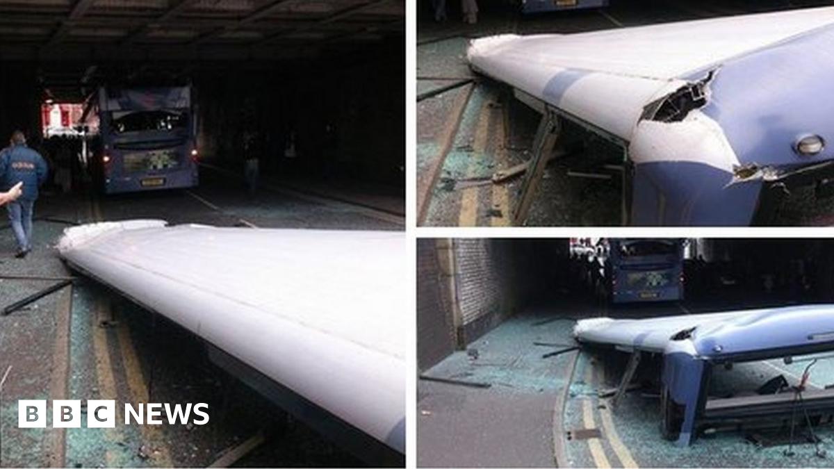 Rochdale bus crash: Three hurt as roof shears off - BBC News