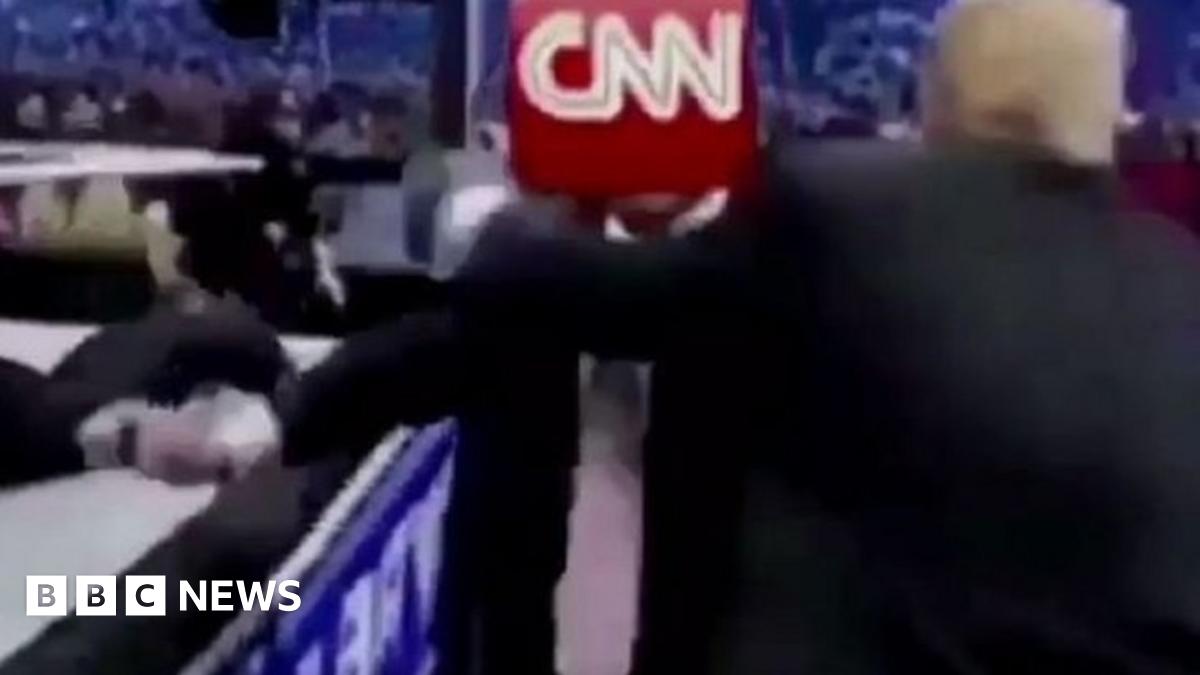 Donald Trump posts video clip of him 'beating' CNN in wrestling - BBC News