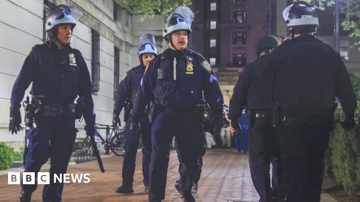 NYPD officer fired gun while clearing Columbia protest - BBC News