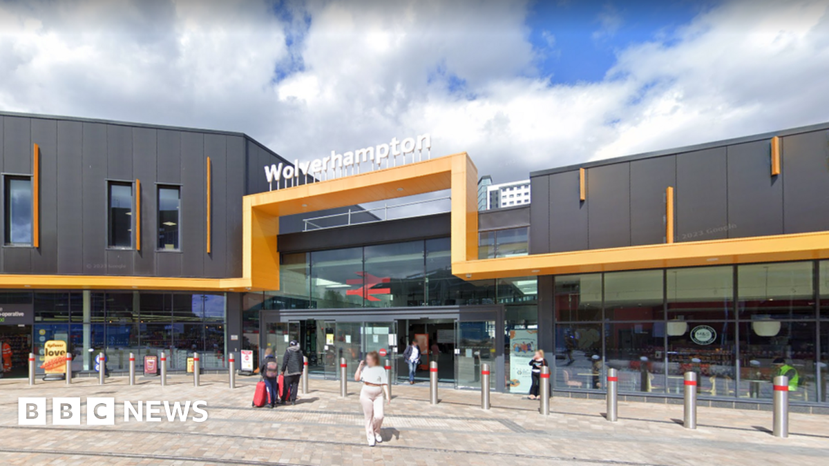 Wolverhampton Railway Station evacuated after fire on train - BBC News
