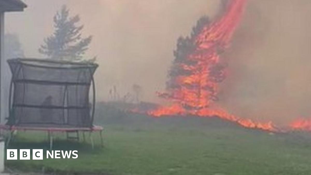 Daviot wildfire burns next to back garden amid power cuts - BBC News