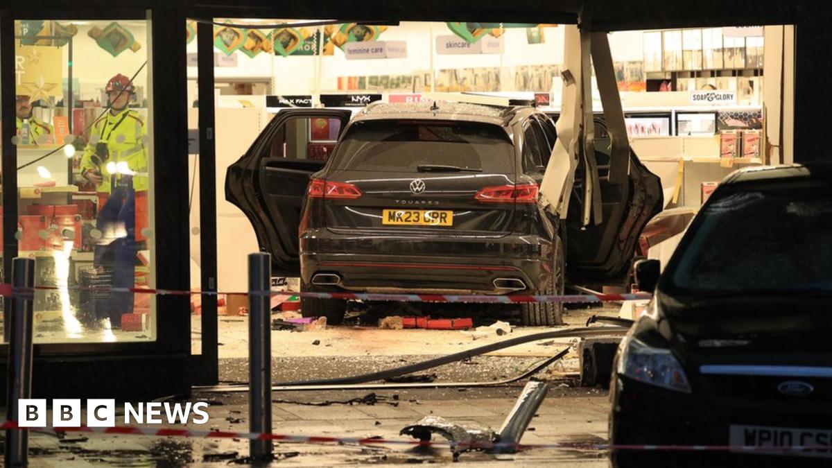 Driver injured after car smashes into Boots in Liverpool - BBC News