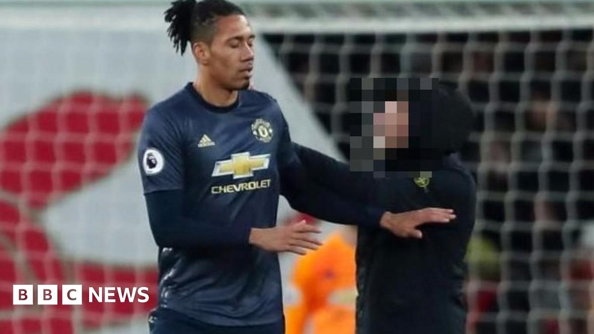 Arsenal v Manchester United: Man charged with Smalling assault - BBC News