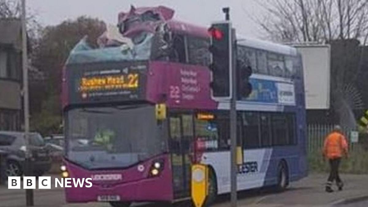 Bus hits bridge in Leicester, injuring six people - BBC News