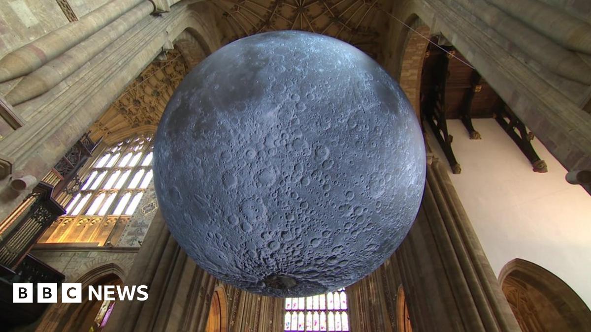 Museum of the Moon sculpture lands at Exeter Cathedral - BBC News