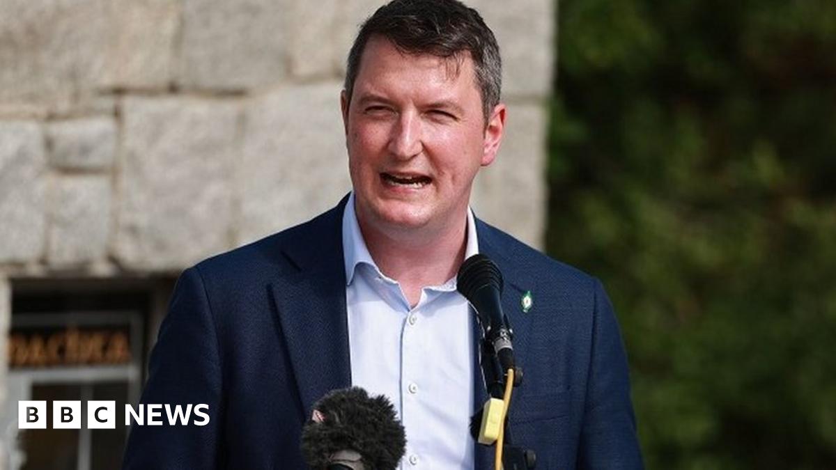 John Finucane defends 'right to remember' at IRA commemoration - BBC News