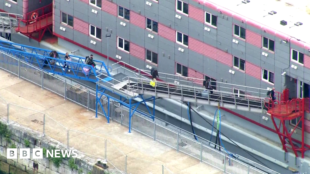 Bibby Stockholm: Fifteen asylum seekers board on first day using barge - BBC News