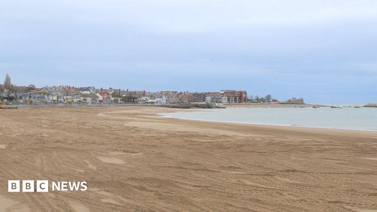 Rhos-on-Sea beach reopens with million tonnes of seabed sand - BBC News