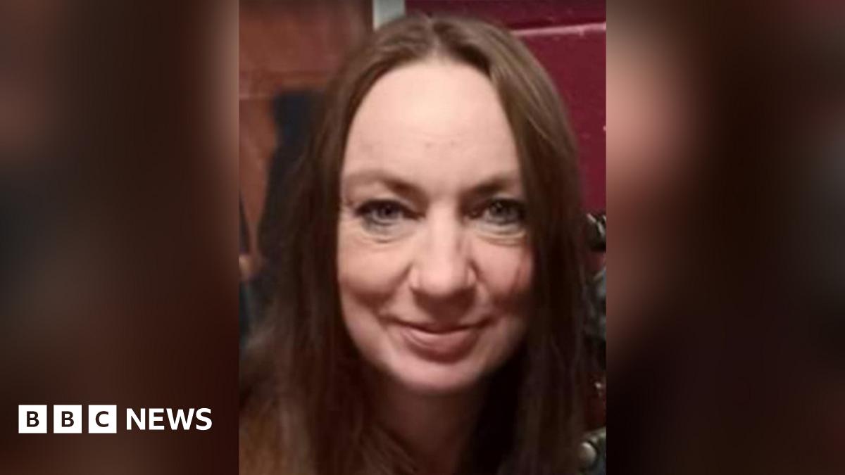 Leeds murder accused in court after woman found dead - BBC News