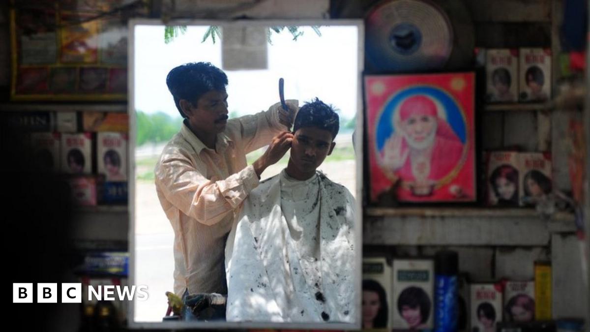 Why the Indian barbershop is a unique institution - BBC News