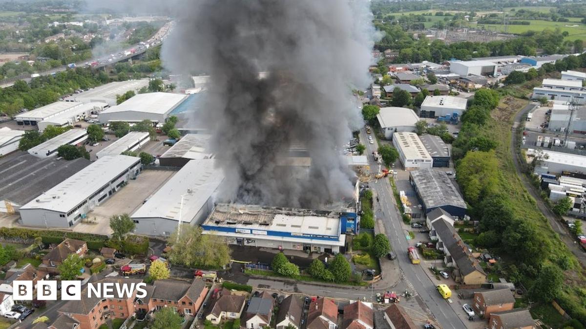 Byfleet storage depot fire sees 24 items salvaged - BBC News
