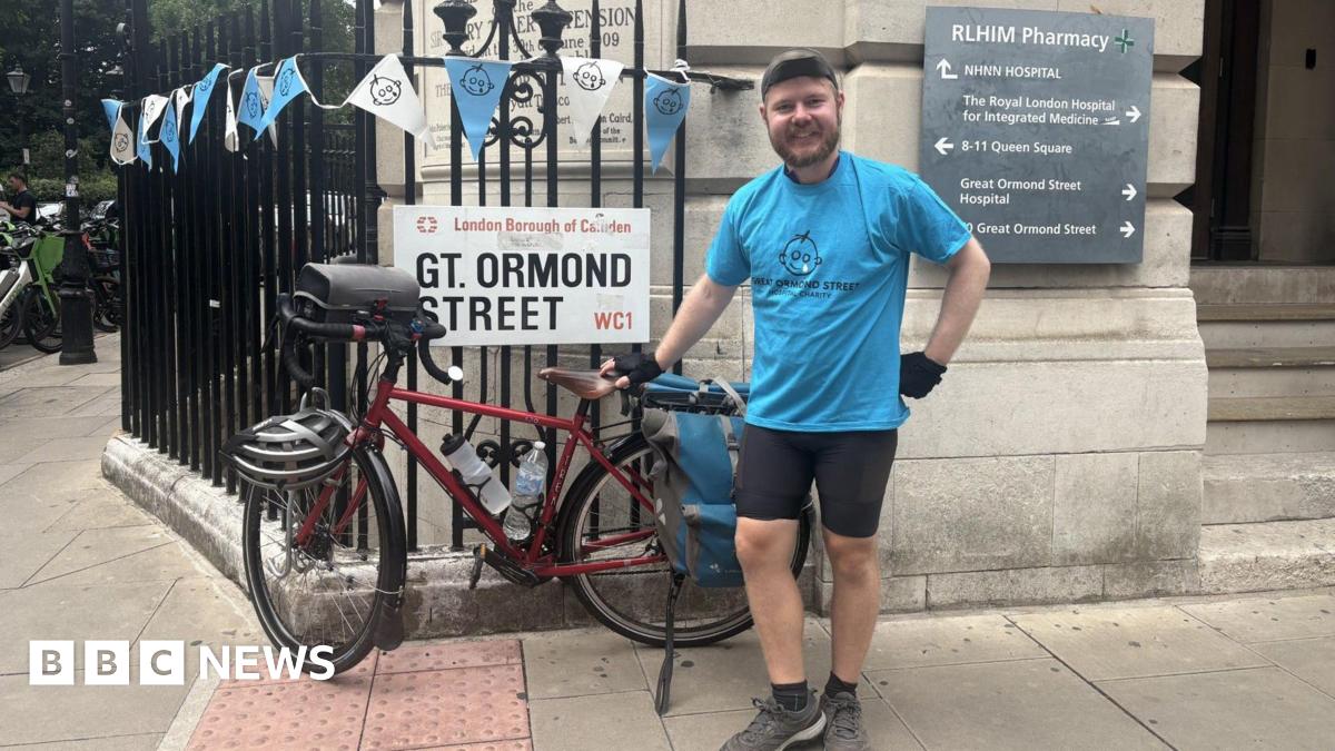 Folkestone teacher finishes 17,000-mile round-the-world cycle - BBC News