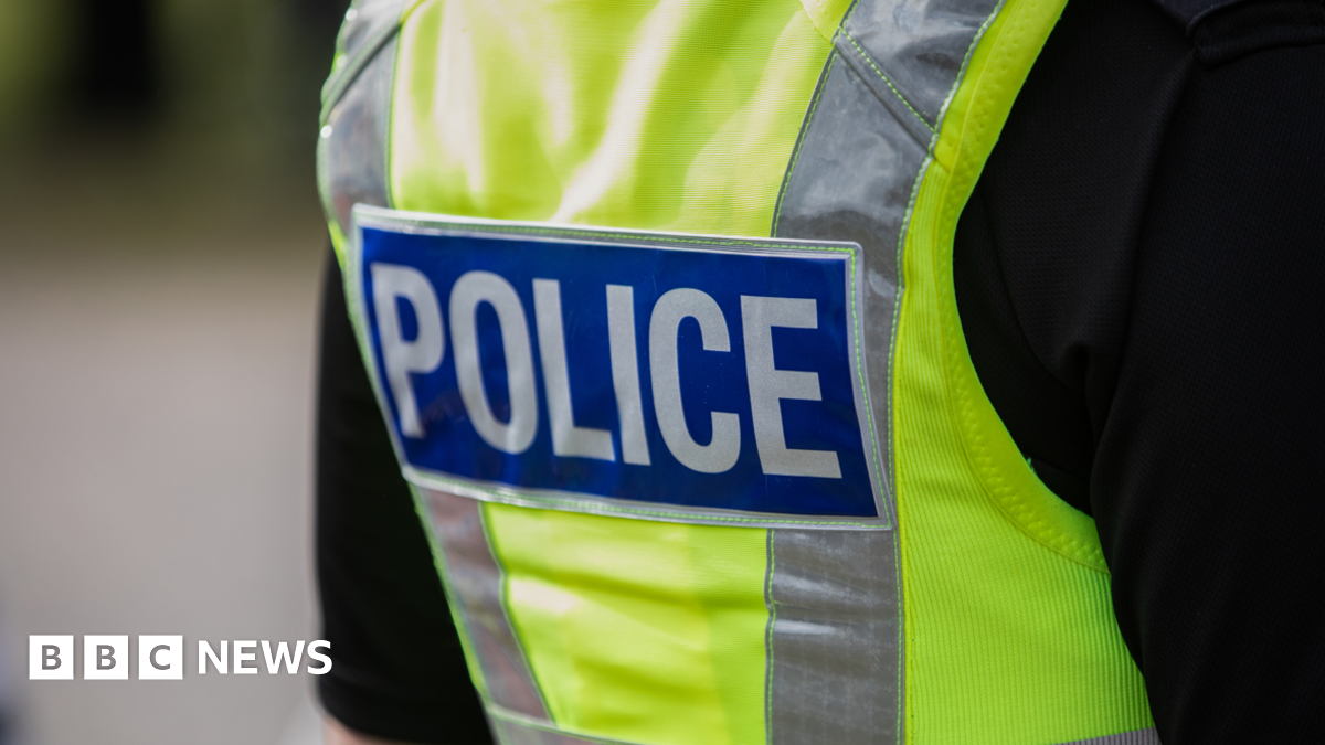 Three arrested after body of man found at Cannock house - BBC News