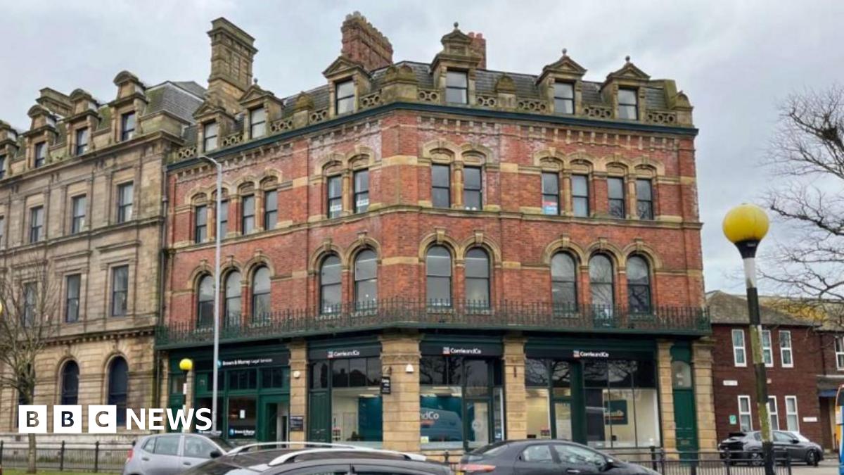 Barrow building's netting to be replaced after birds destroy it - BBC News