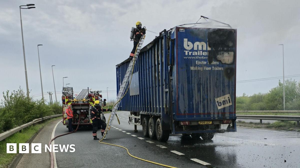 Lorry fire leads to long queues in Peterborough - BBC News
