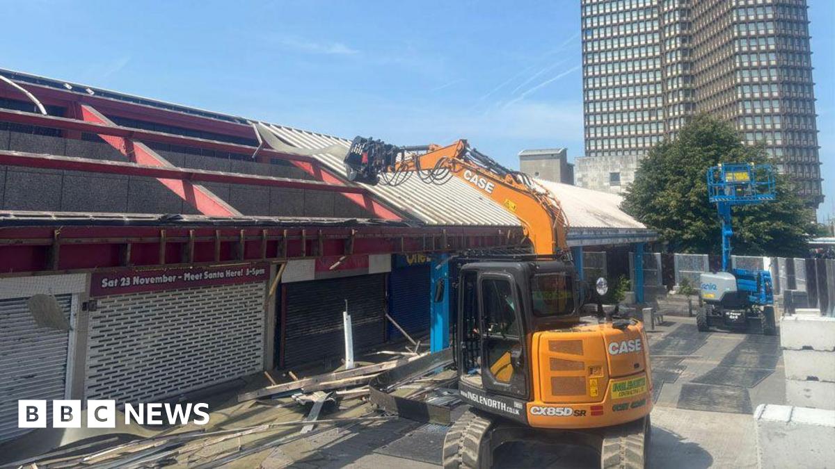 Demolition begins on part of 1960s Bootle shopping centre - BBC News