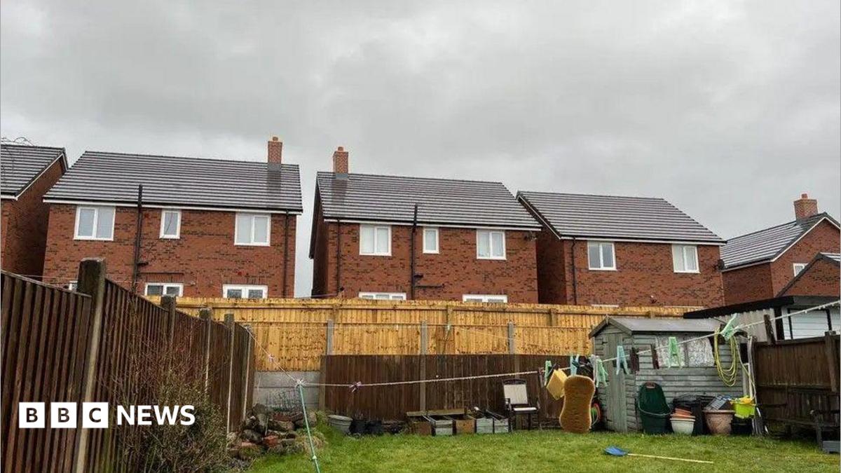 Row continues over Cheadle houses built too high - BBC News