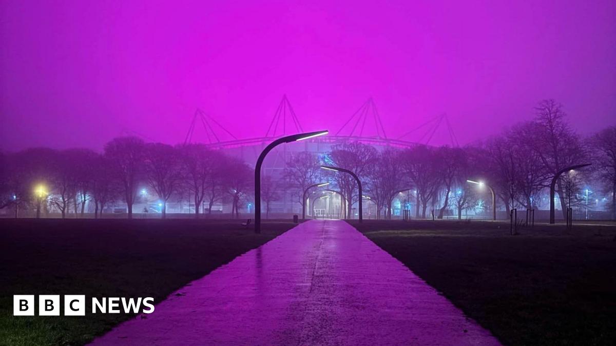 MKM Stadium in Hull lights up city's sky with pink hue - BBC News