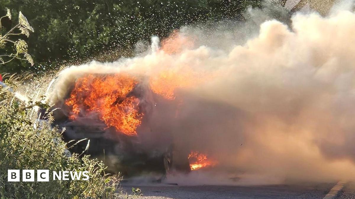 Cambridgeshire fire service shares dramatic images of car blaze - BBC News
