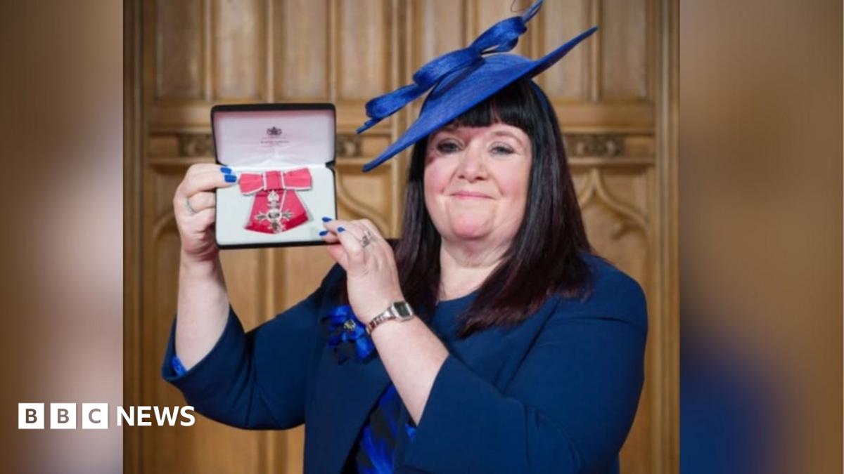 'My proudest day', says Derbyshire solicitor on collecting MBE - BBC News