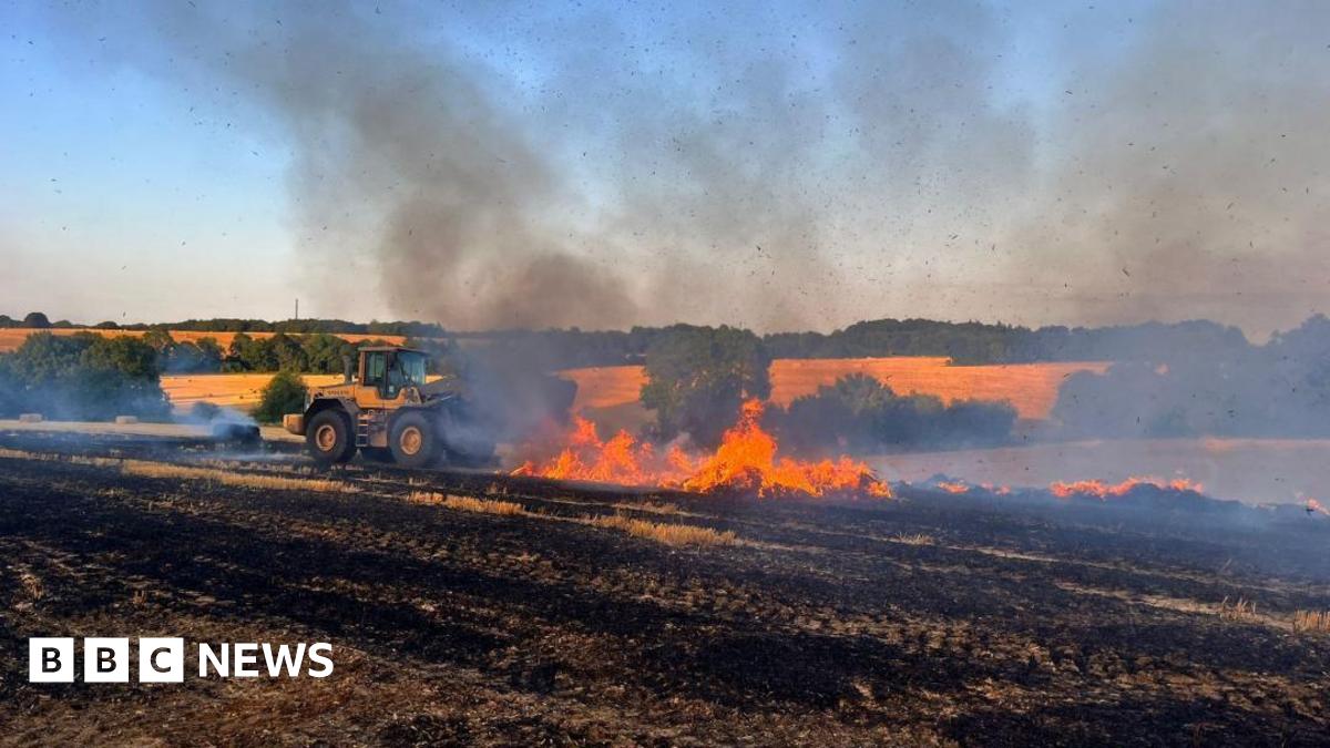 Farmers help firefighters tackle hay blaze near Brentwood - BBC News