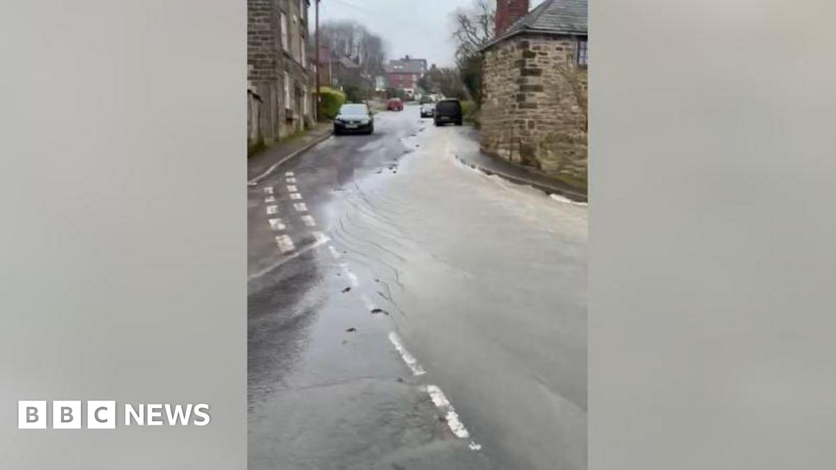 Burst main sends water flowing through Derbyshire village - BBC News