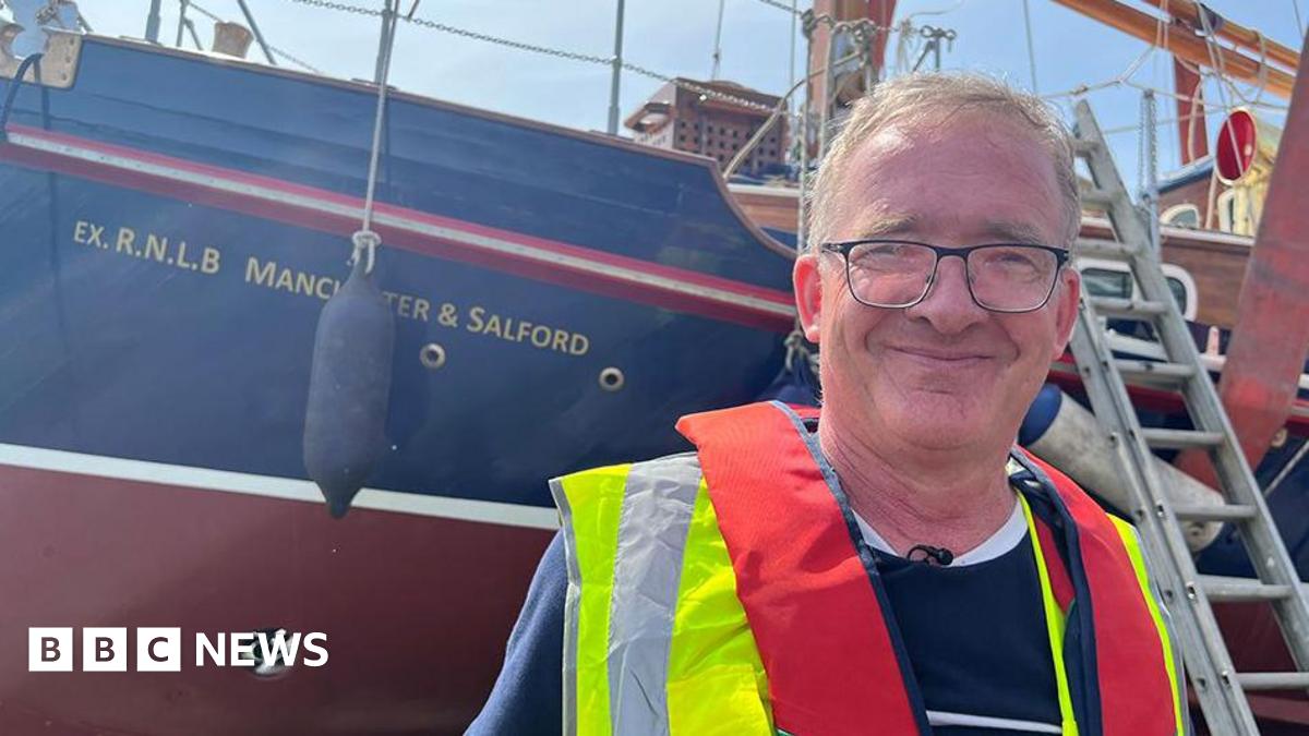 Shipwrecked lifeboat back on the water after 20-year restoration - BBC News