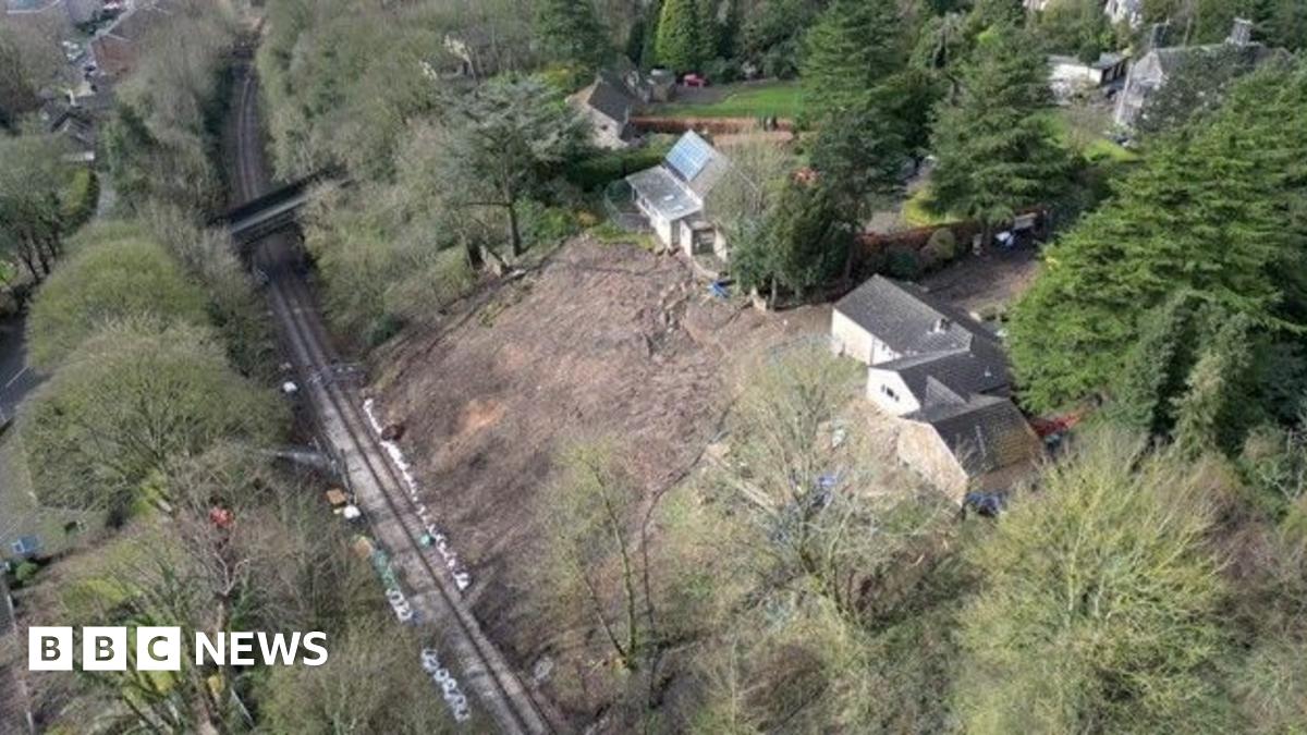 Two homes in Baildon to be demolished due to railway landslip - BBC News