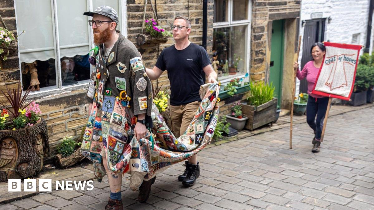 Coat of Hopes: Community artwork arrives at Haworth church - BBC News