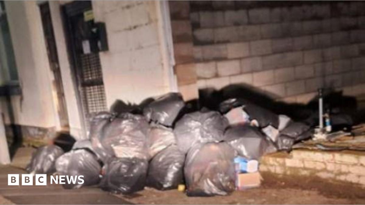 Anger at fly-tipping and 'rats having a field day' in Bootle - BBC News