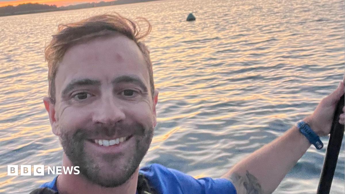 Paddleboarder claims world record after 43-hour challenge - BBC News