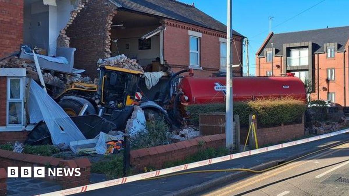 Arrest after crash sees tractor plough into homes - BBC News