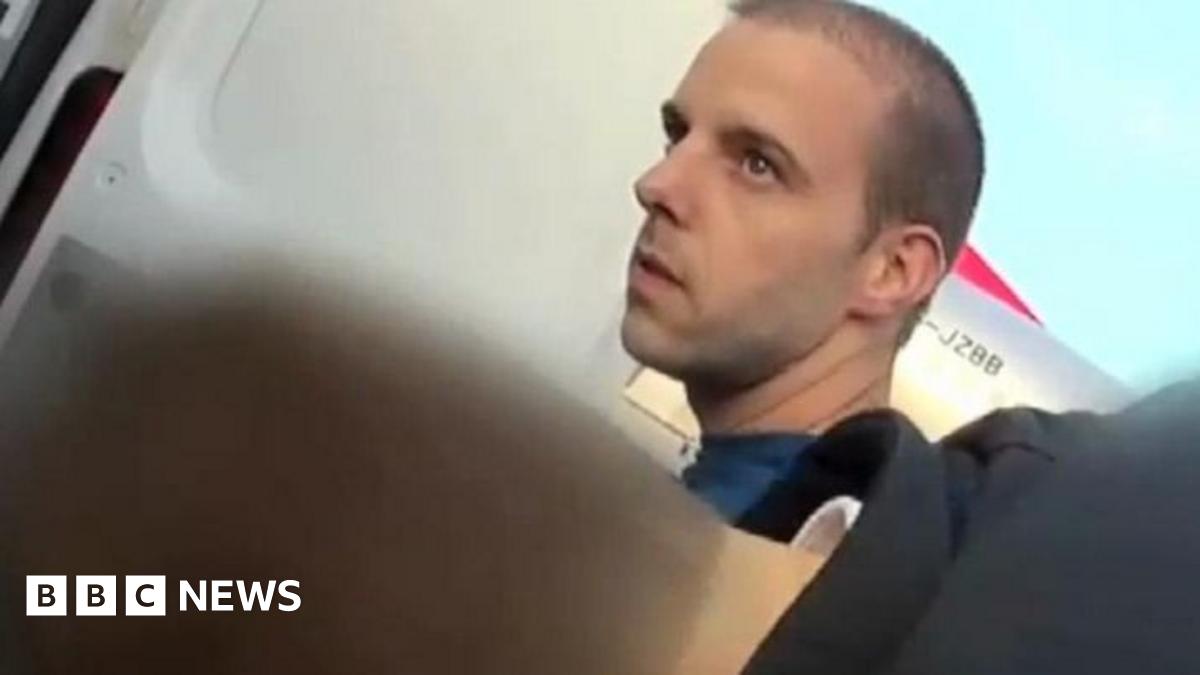 Moment murderer John Belfield taken off plane and arrested - BBC News