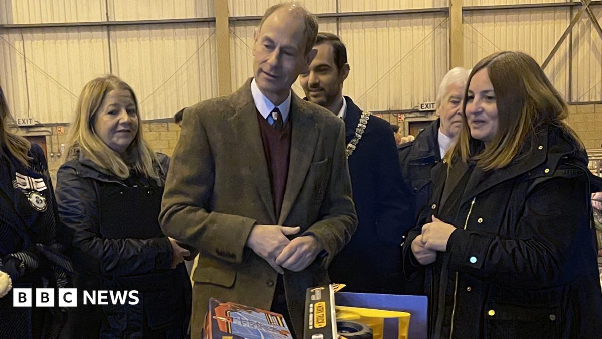 Prince Edward helps pack Christmas gifts during NI visit - BBC News
