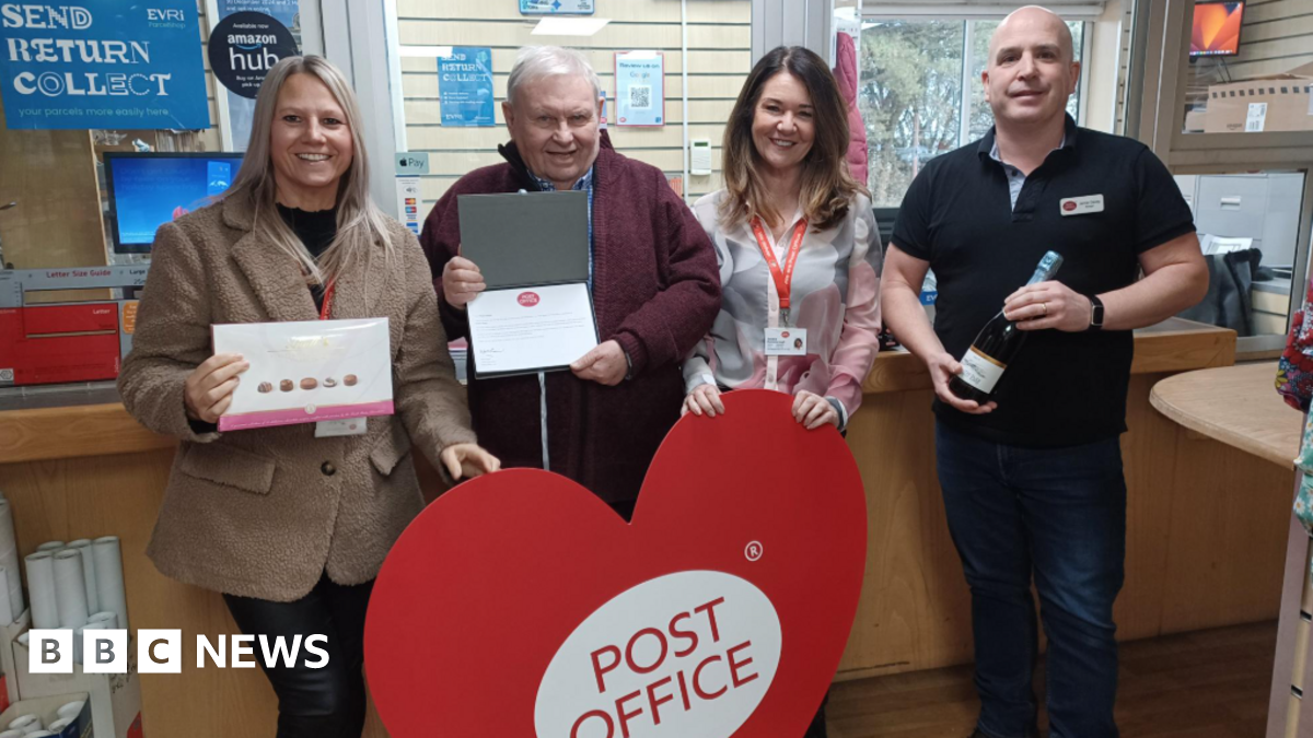 Devon postmaster marks 50 years with long service award - BBC News