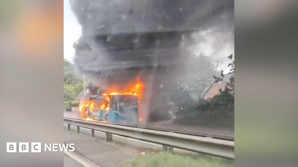 A52 bus fire: Drivers told to avoid main road due to blaze - BBC News