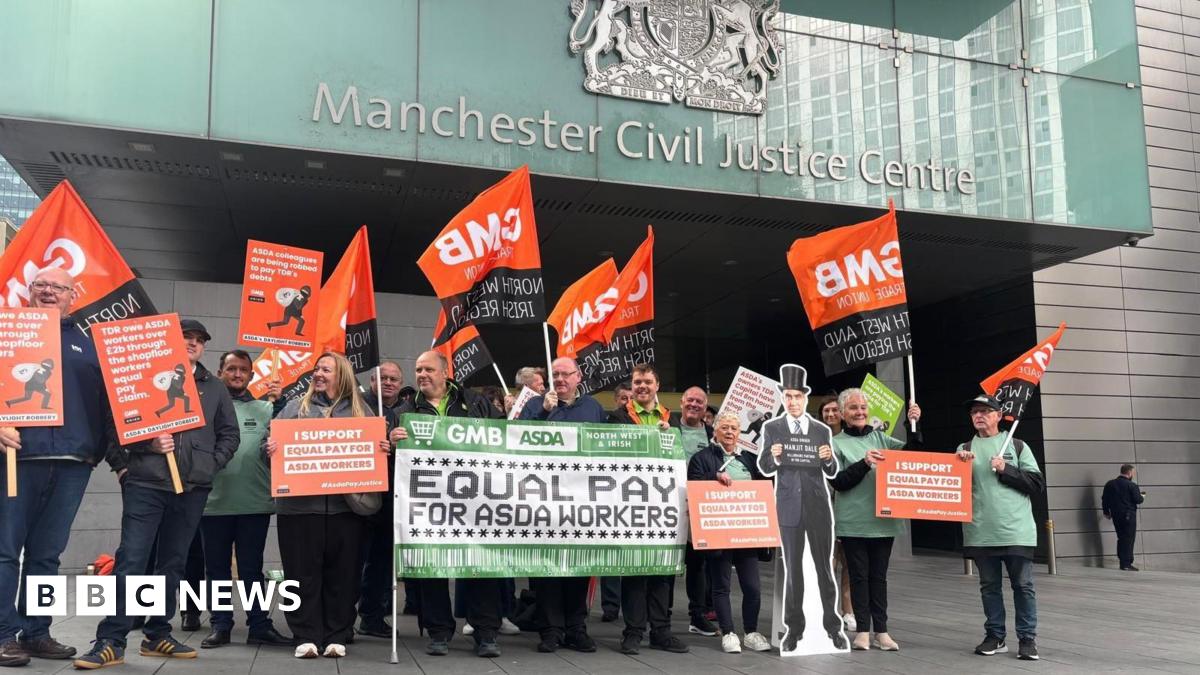 Asda workers hold rally as equal pay case begins in Manchester - BBC News