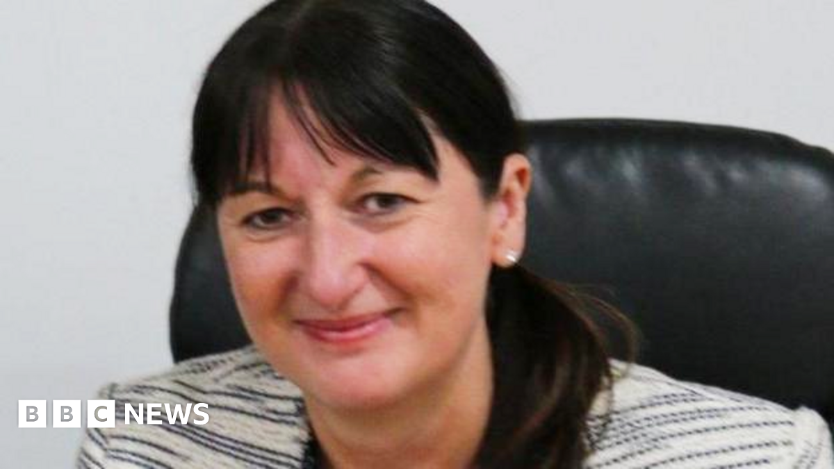 Caerphilly council pays off absent boss £209,000 amid money woes - BBC News