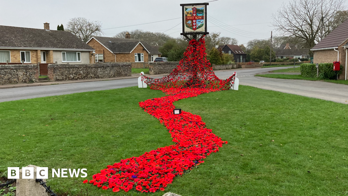 West Row creates cascade of poppies for Remembrance Day - BBC News