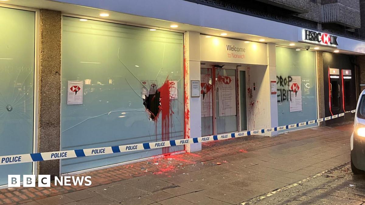 HSBC bank in Norwich vandalised with paint and windows smashed - BBC News