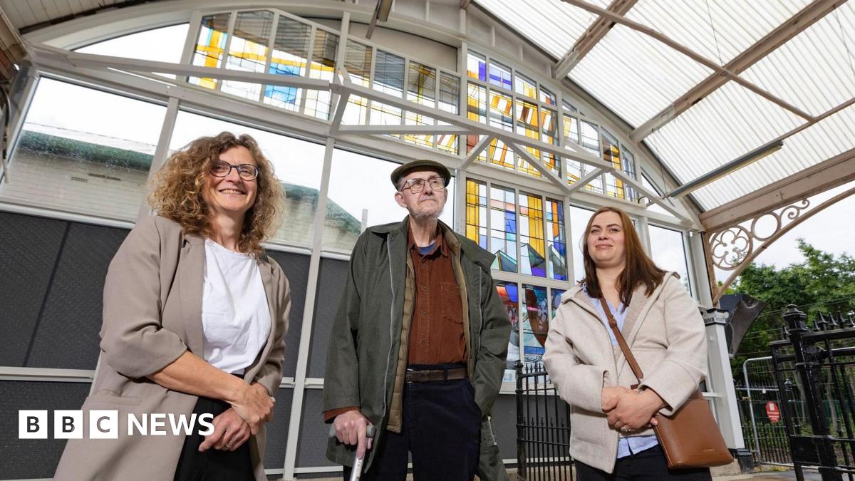 Monkseaton station's glass repaired by artist's ex-pupil - BBC News