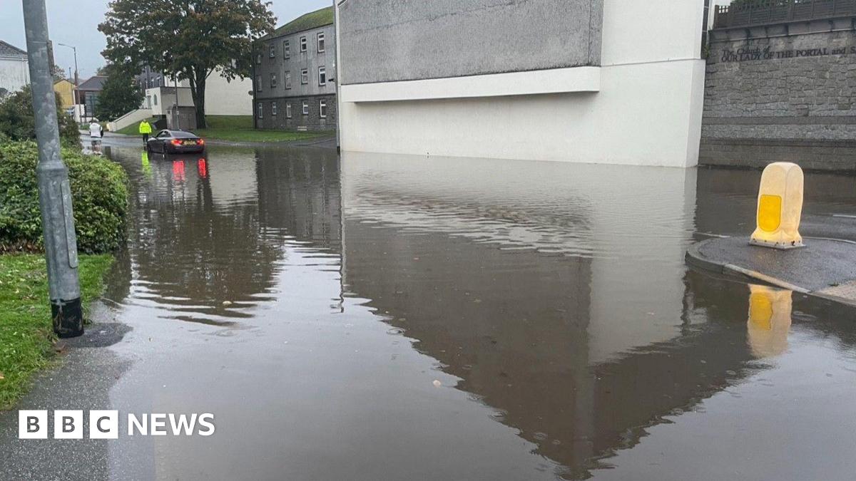 Flooding in Cornwall made road look 'more like a waterfall' - BBC News