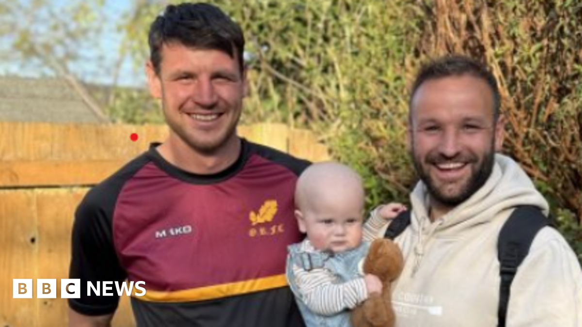 Devon friends climb mountain to help find cure for baby - BBC News