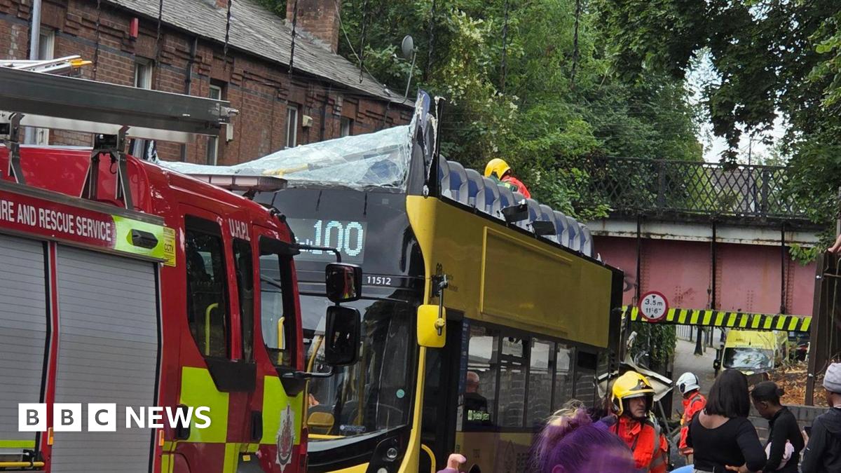 Eccles: Fifteen hurt as double-decker bus hits bridge - BBC News