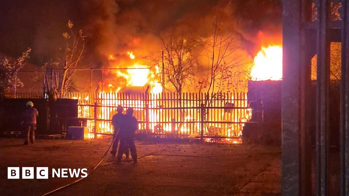 Four cars and van destroyed in Bilston industrial yard fire - BBC News