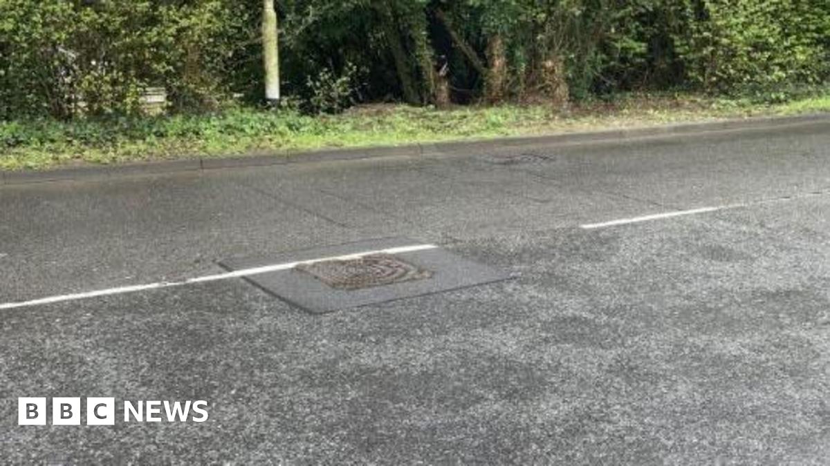 Plymouth manhole covers missing after heavy rain - BBC News