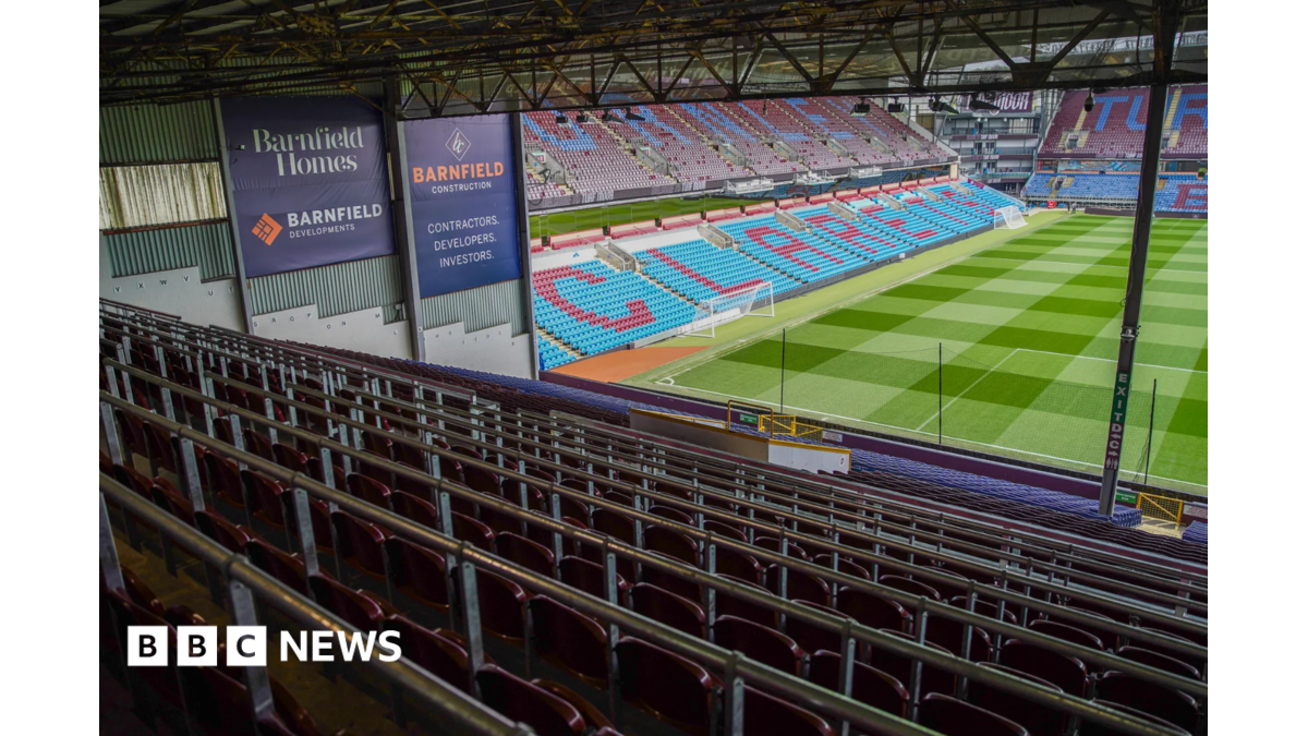 Burnley FC opens safe standing for Premier League clash - BBC News