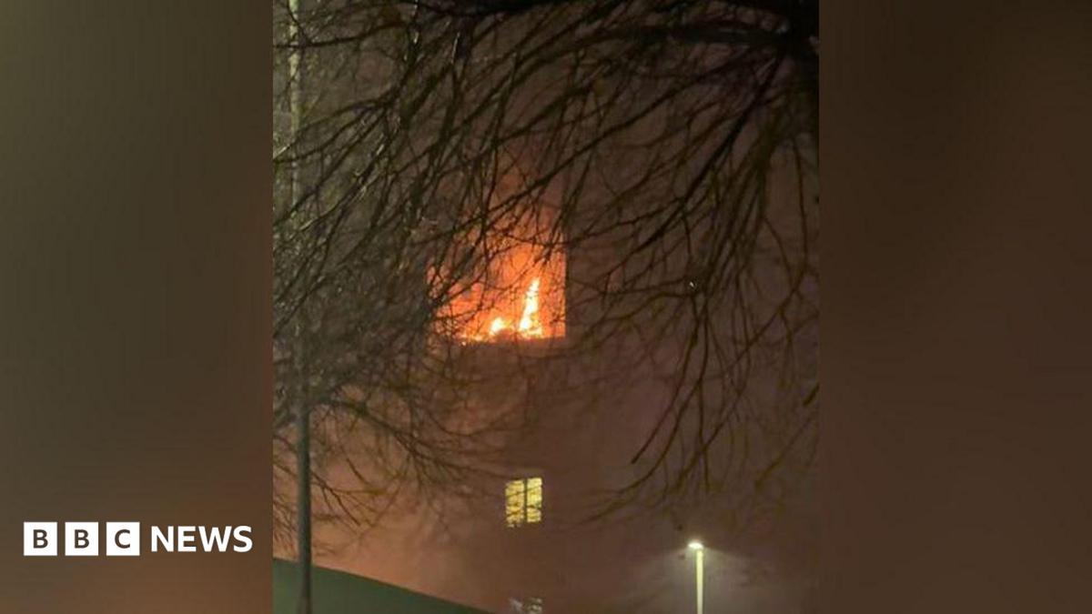 Fire crews attacked with fireworks at Huyton flats blaze - BBC News