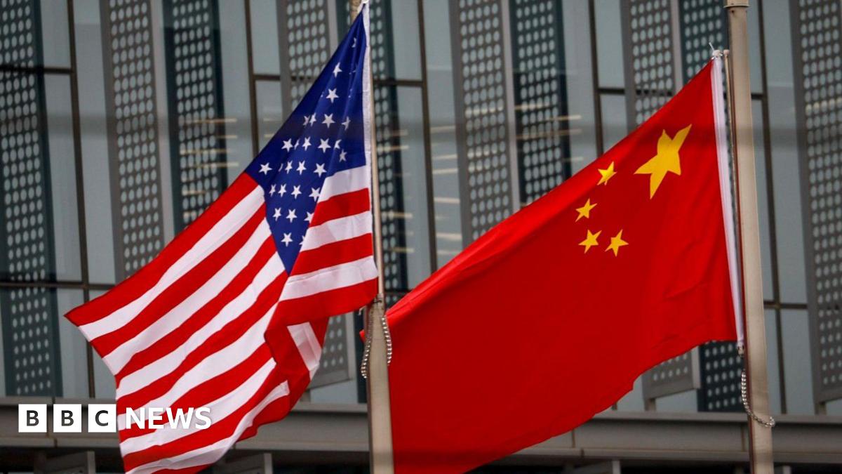 US charges Chinese dissident with allegedly spying for Beijing - BBC News